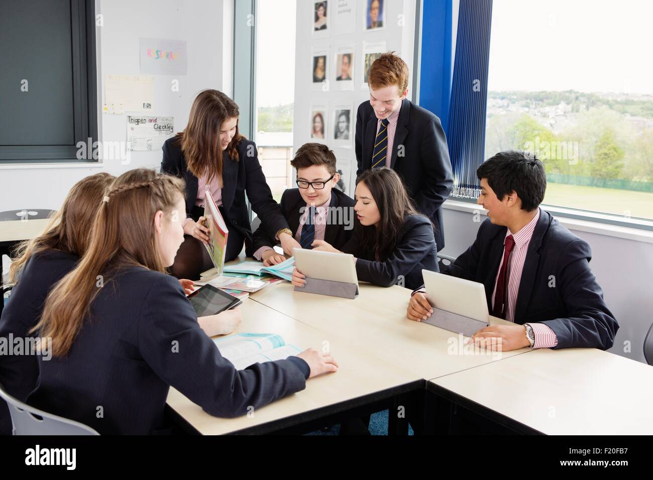 Group work school uniform hi-res stock photography and images - Alamy