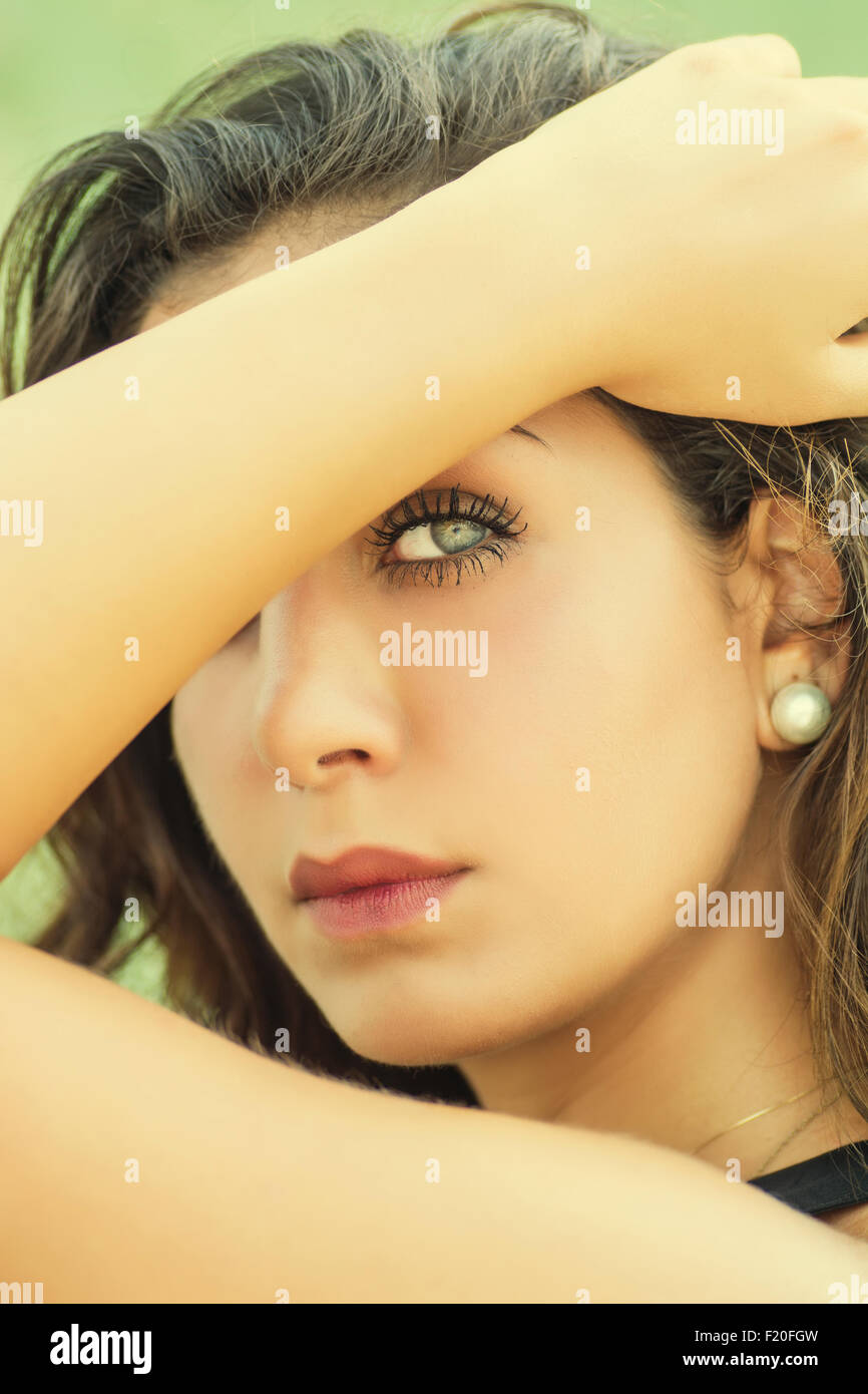 Serious young woman staring Stock Photo - Alamy