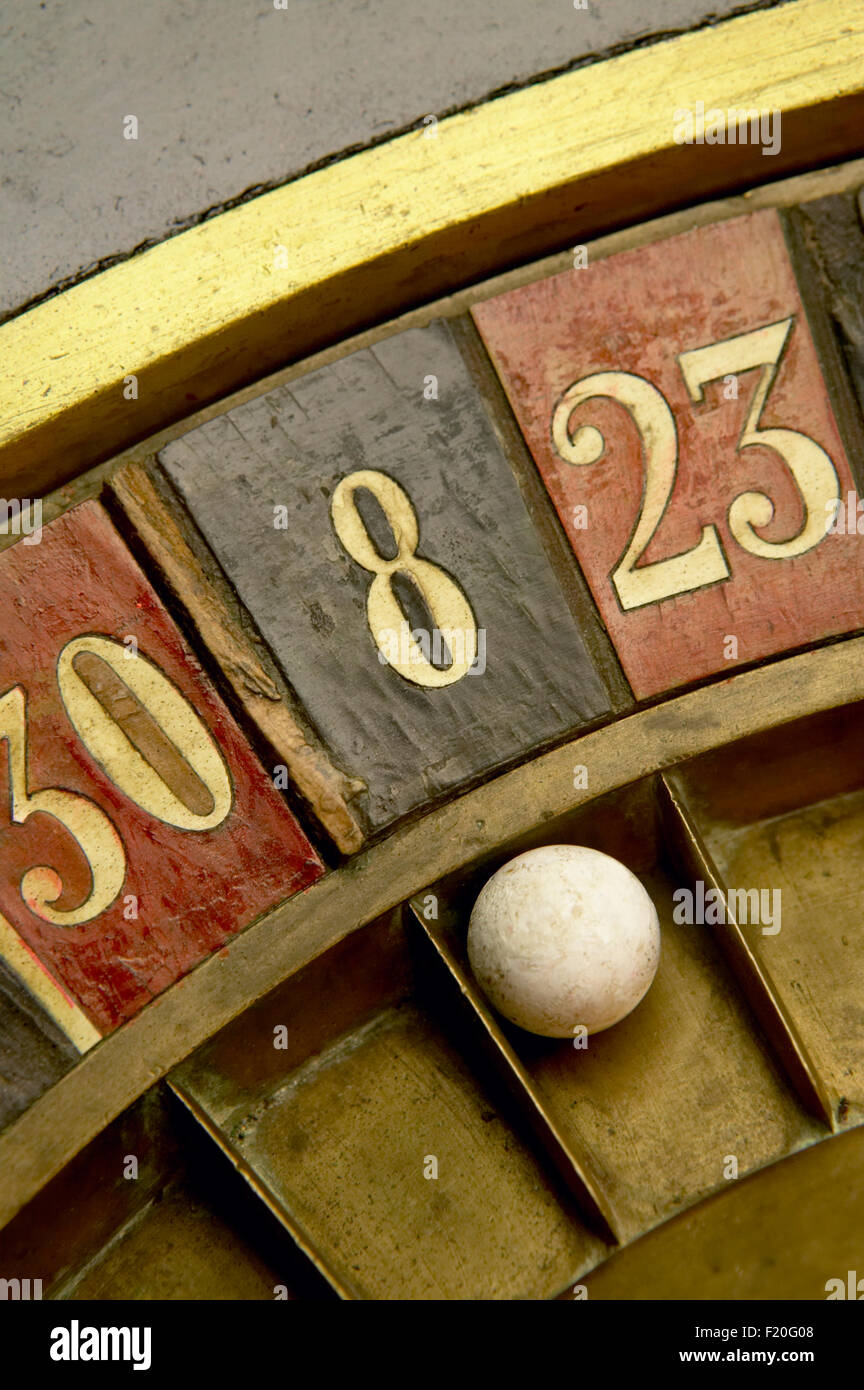 Ball on a vintage roulette with numbers Stock Photo - Alamy