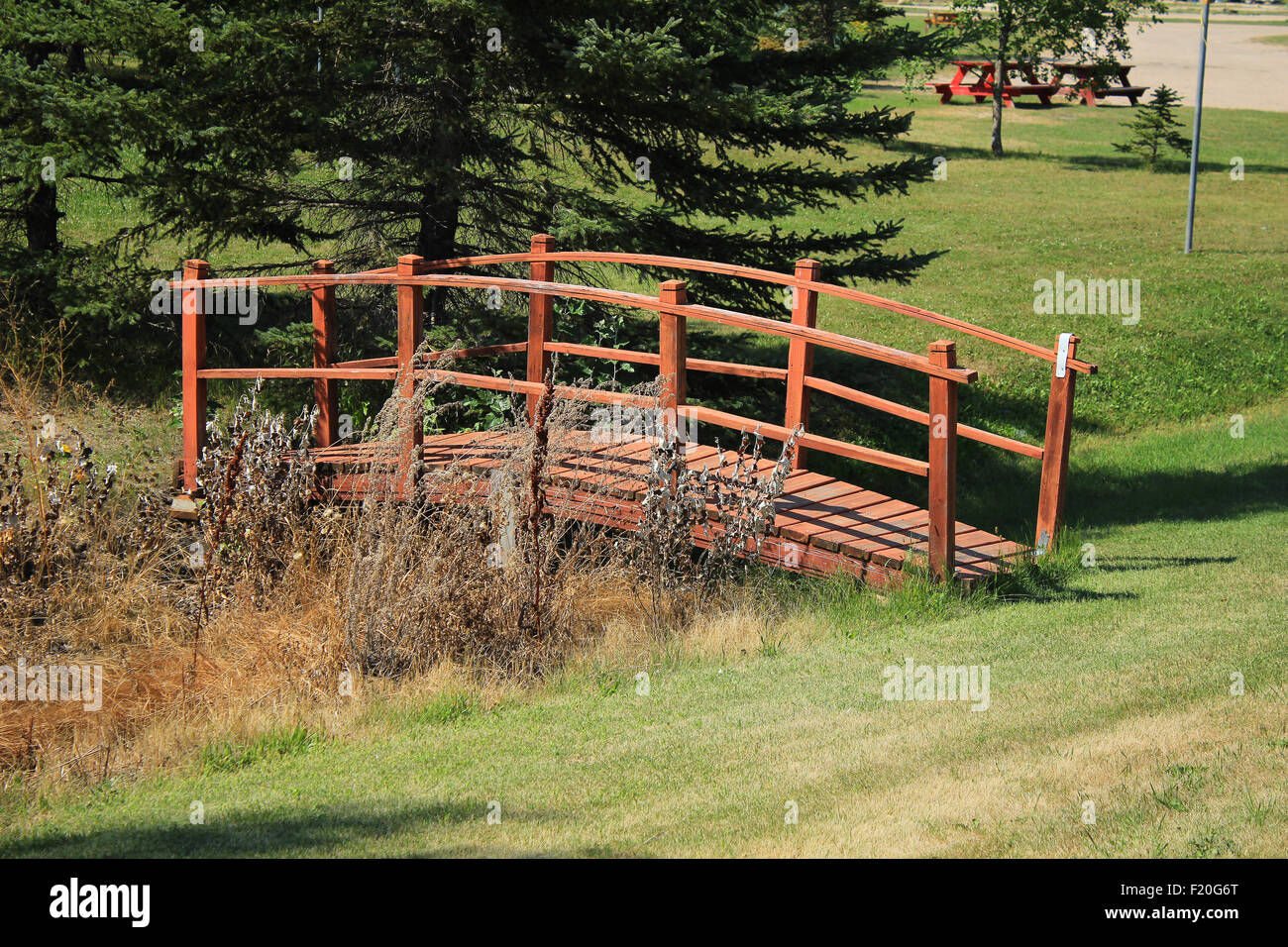 A wooden bridge over a ditch in Morden, Manitoba, Canada Stock Photo ...