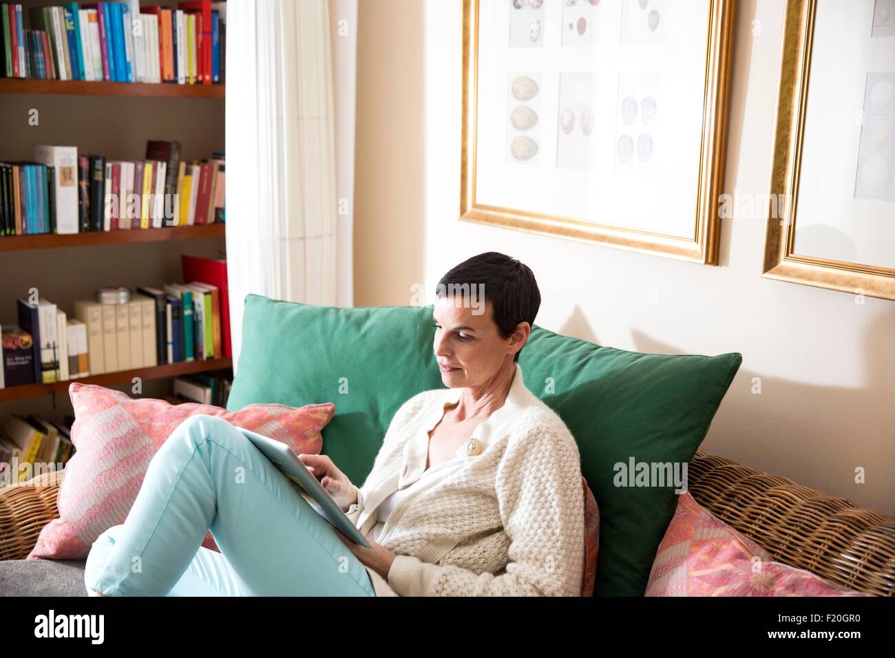 Woman reading at home Stock Photo - Alamy