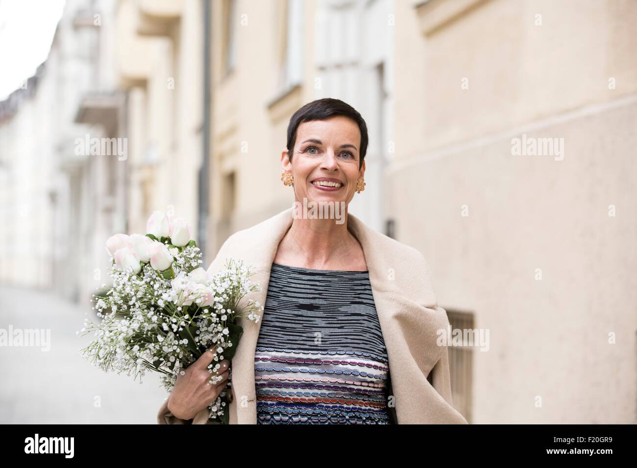 Lapel flower woman hi-res stock photography and images - Alamy
