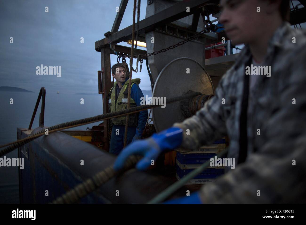 Fishermen at sea Stock Photo - Alamy