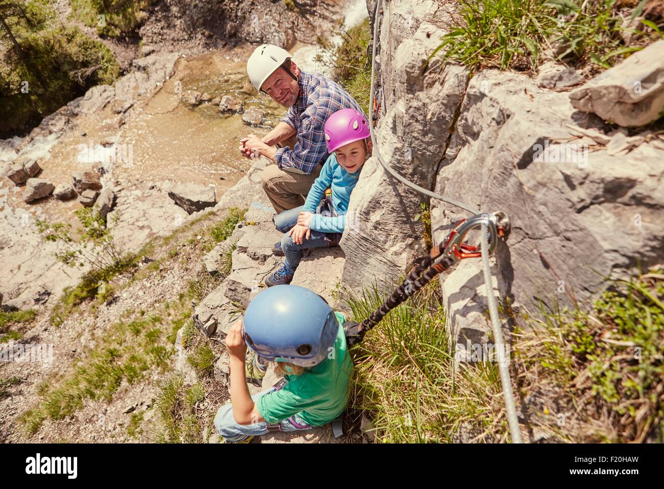 Children on rocks hi-res stock photography and images - Alamy