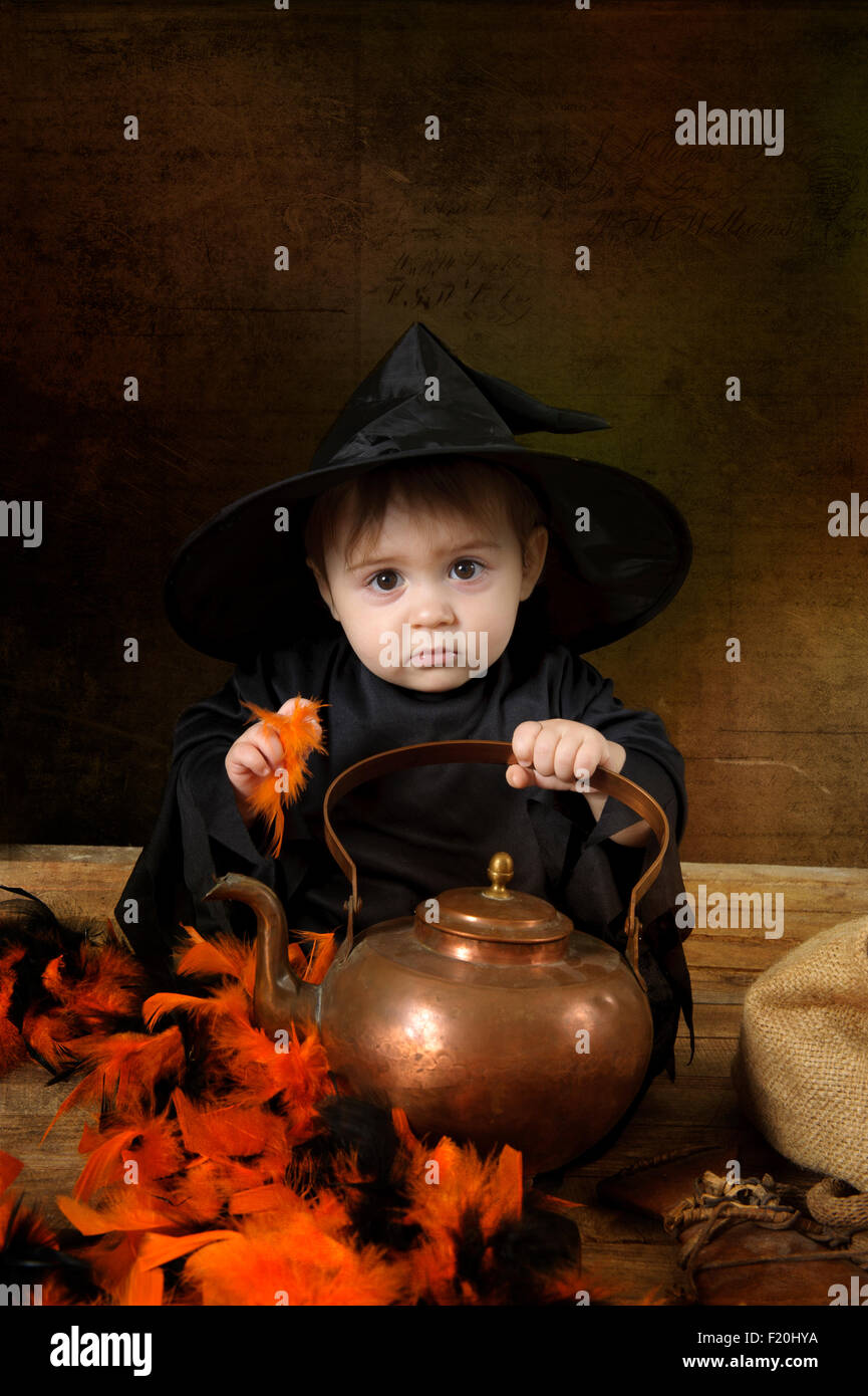 Little baby halloween witch Stock Photo - Alamy