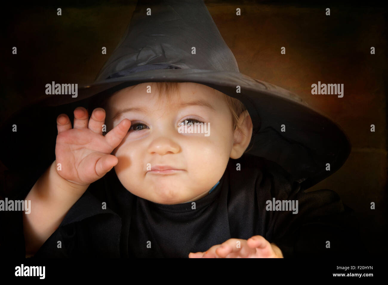 Little baby halloween witch Stock Photo - Alamy