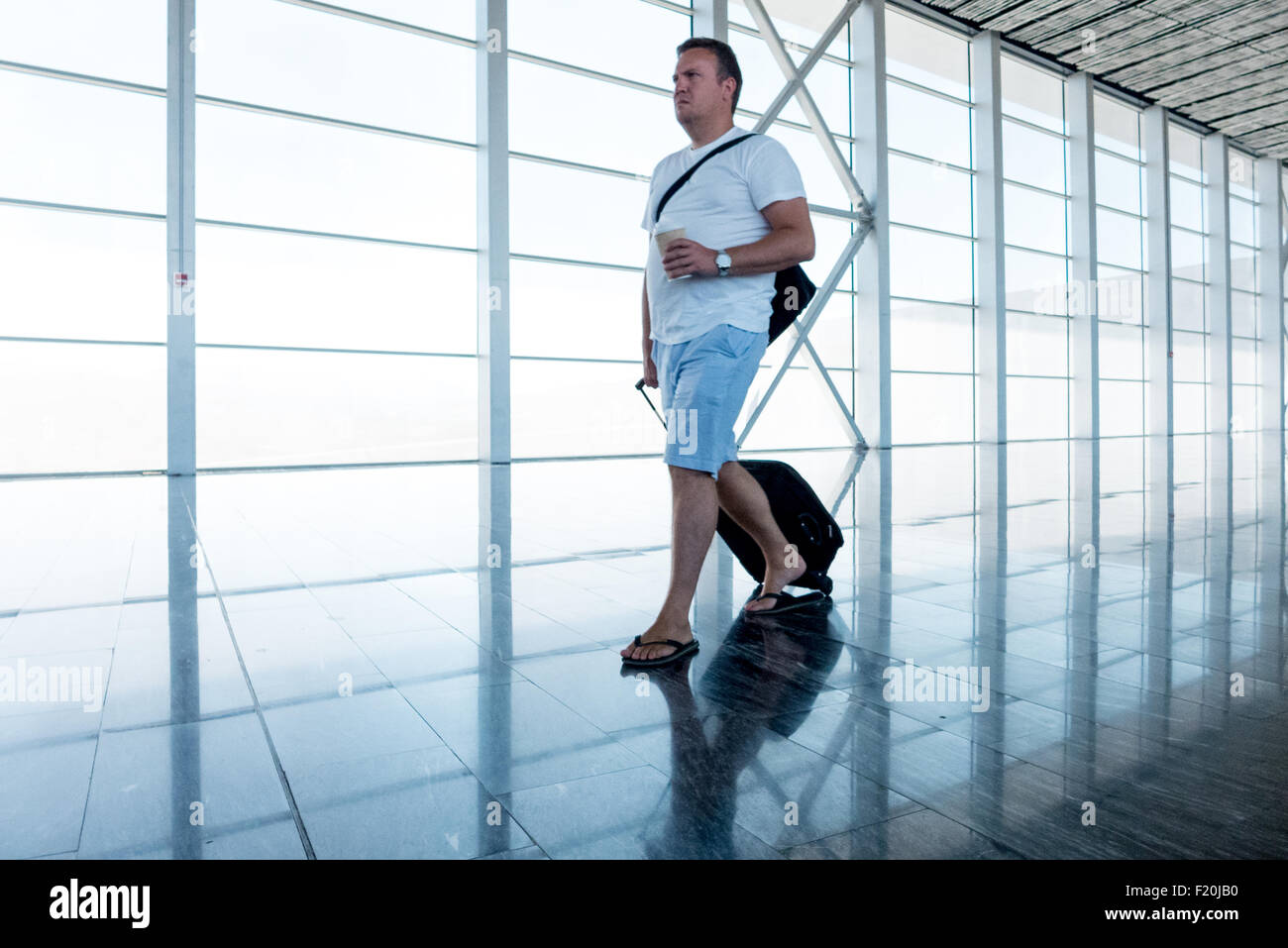 A passenger catching a flight at Bodrum Airport, Turkey Stock Photo - Alamy