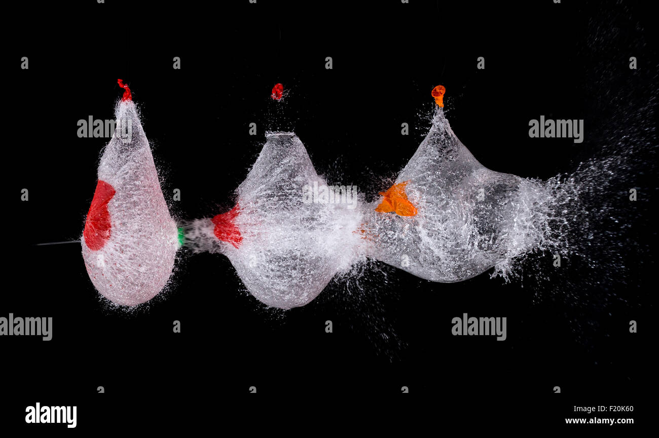 high speed photo of bursting water filled balloon Stock Photo - Alamy