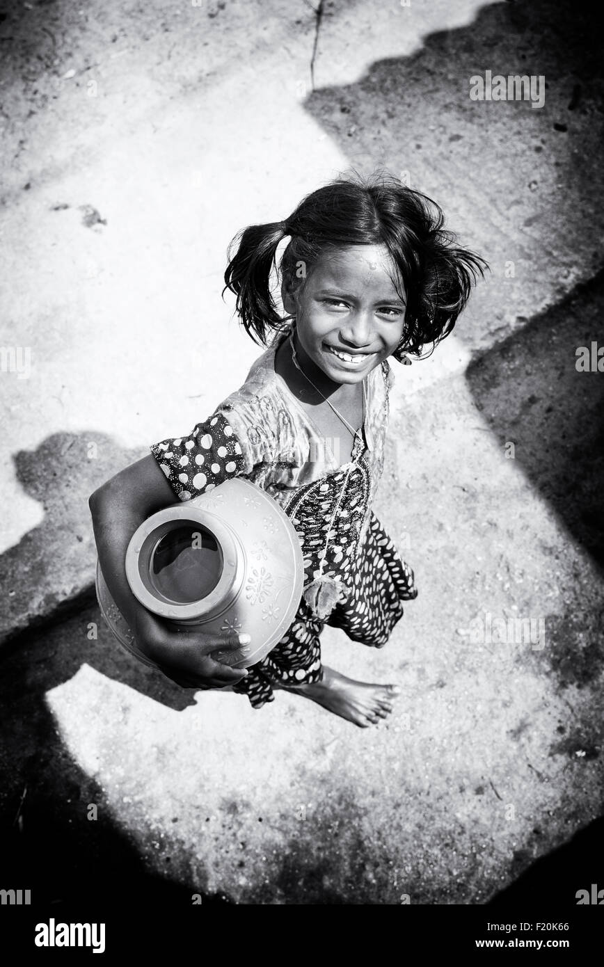 Indian girl carrying water pots hi-res stock photography and images - Alamy
