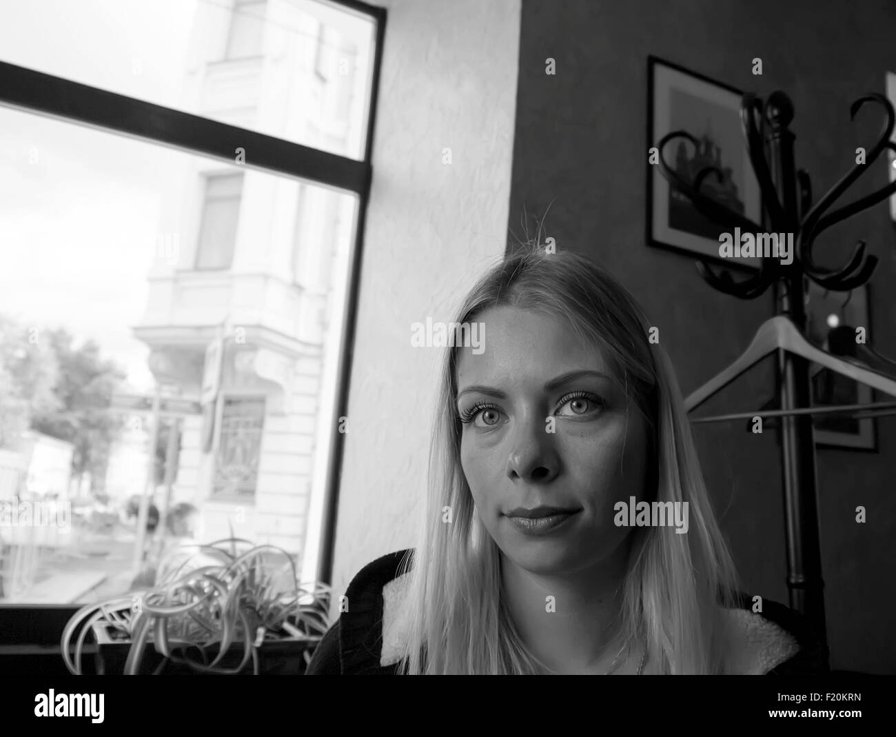 Woman Against A Window Stock Photo - Alamy