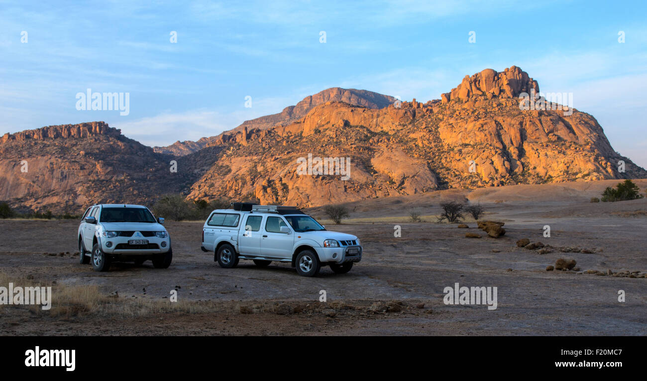Rock formations at Ameib ranch with vehicles Stock Photo - Alamy