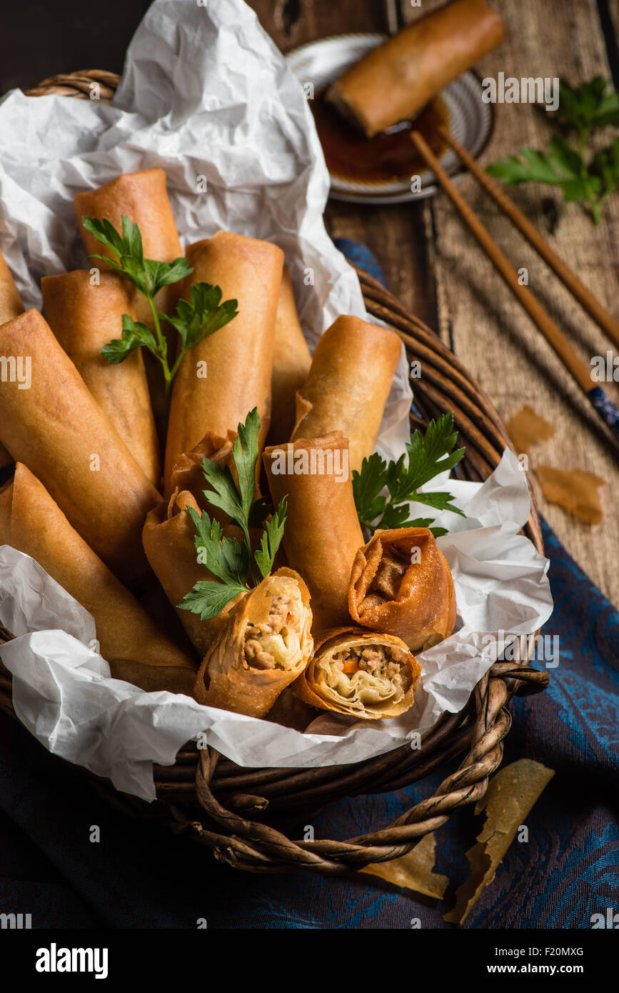 Traditional Asian Fried Spring Rolls in Bamboo Basket with Dipping ...