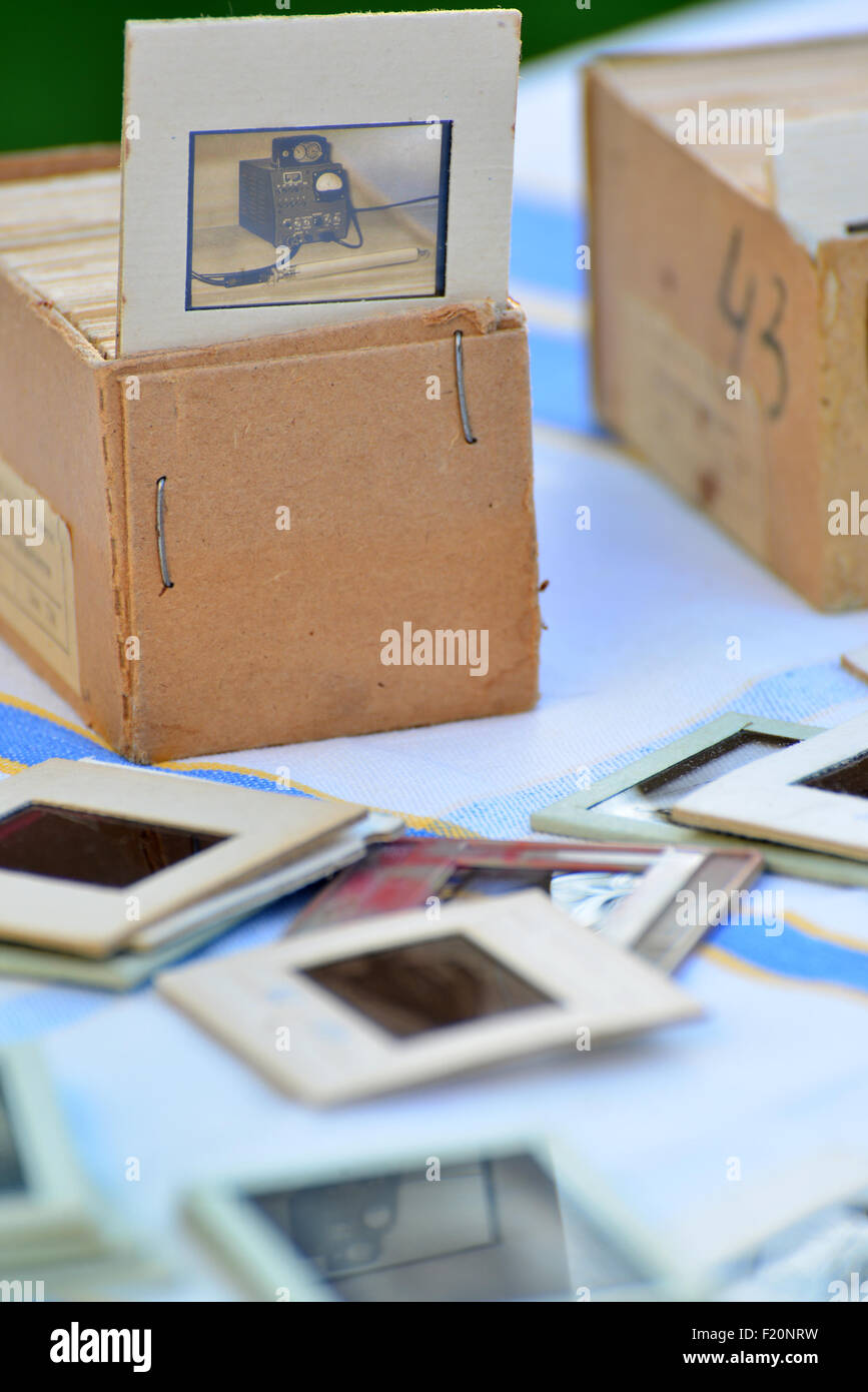 Many old slides on the table in garden Stock Photo - Alamy