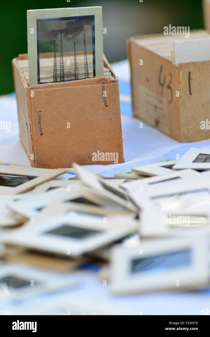 Many old slides on the table in garden Stock Photo - Alamy