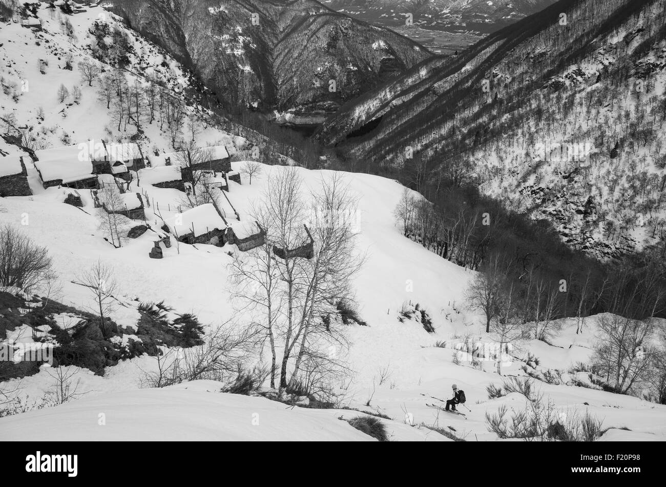 Switzerland, Ticino, Locarno, ski touring across abandoned villages to ...