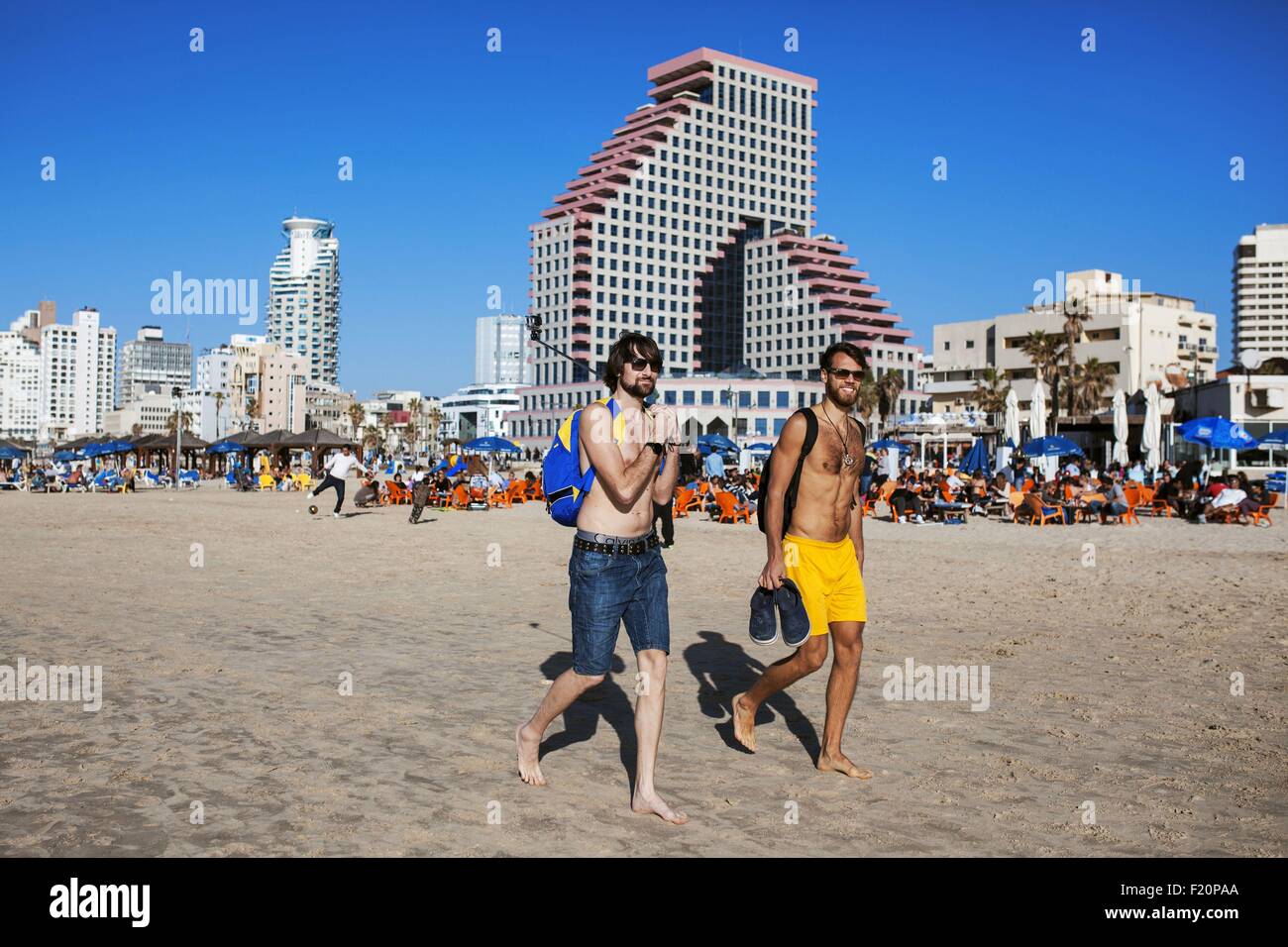 Israel, Tel Aviv, boys walking in the beach Stock Photo - Alamy