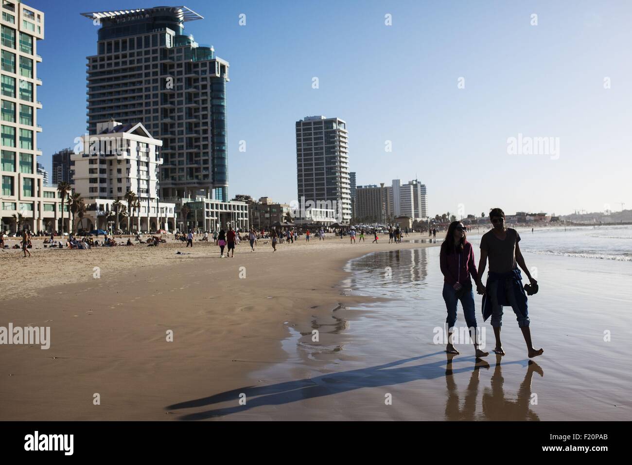 Israel, Tel Aviv, boys walking in the beach Stock Photo - Alamy