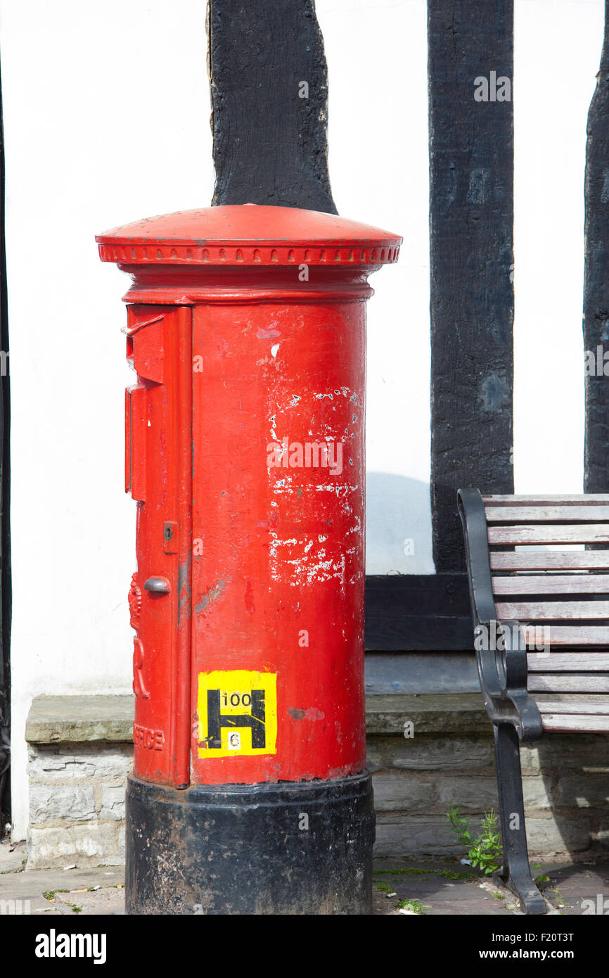Pillar Box by a timber-framed building, England, UK Stock Photo - Alamy