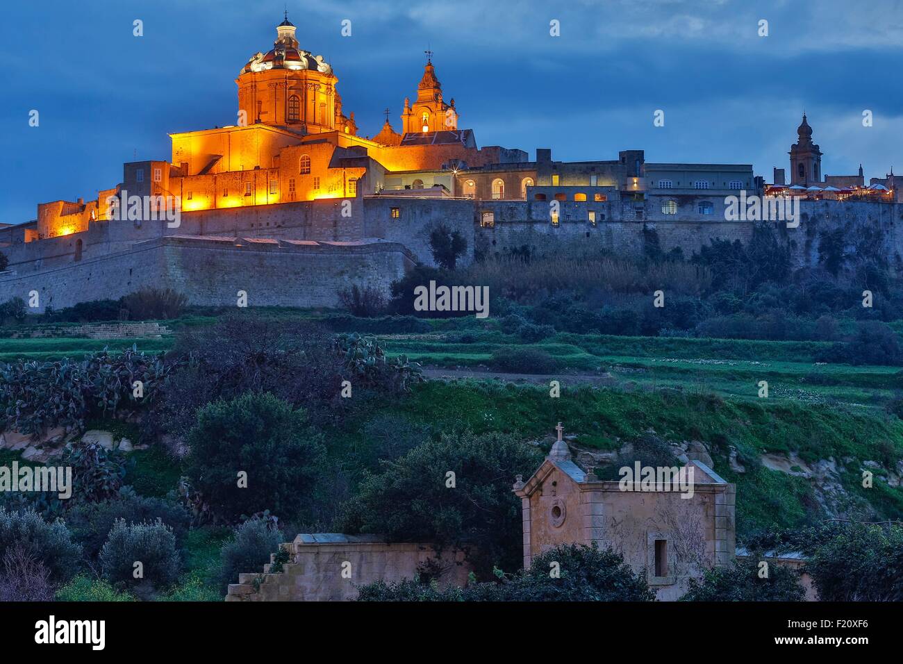 Malta, Mdina, night view of the walls of a fortified city and its ...