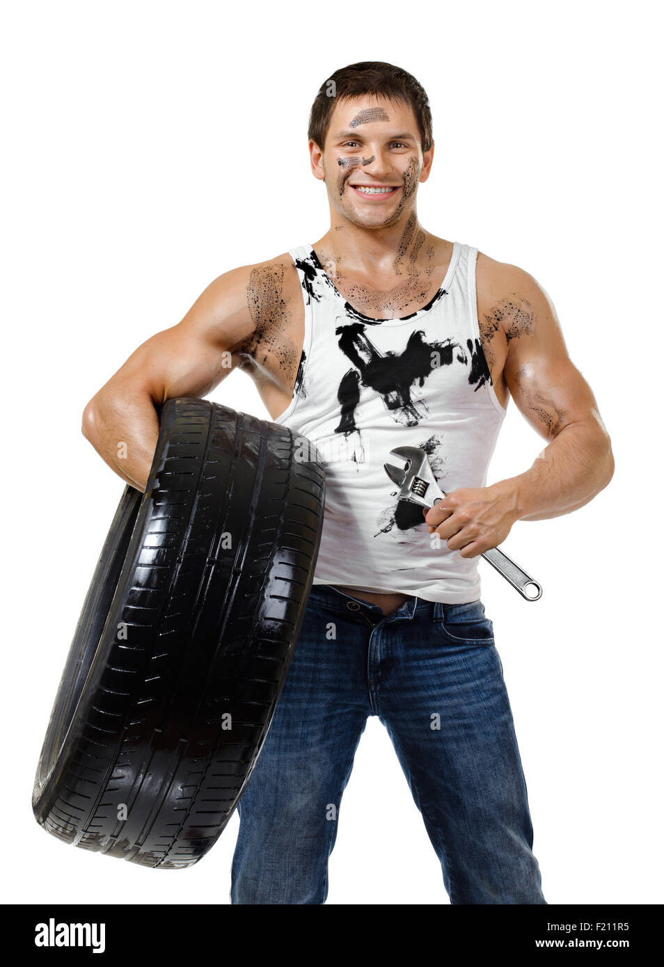 muscular handsome guy hold rubber-tire and white, on white background ...