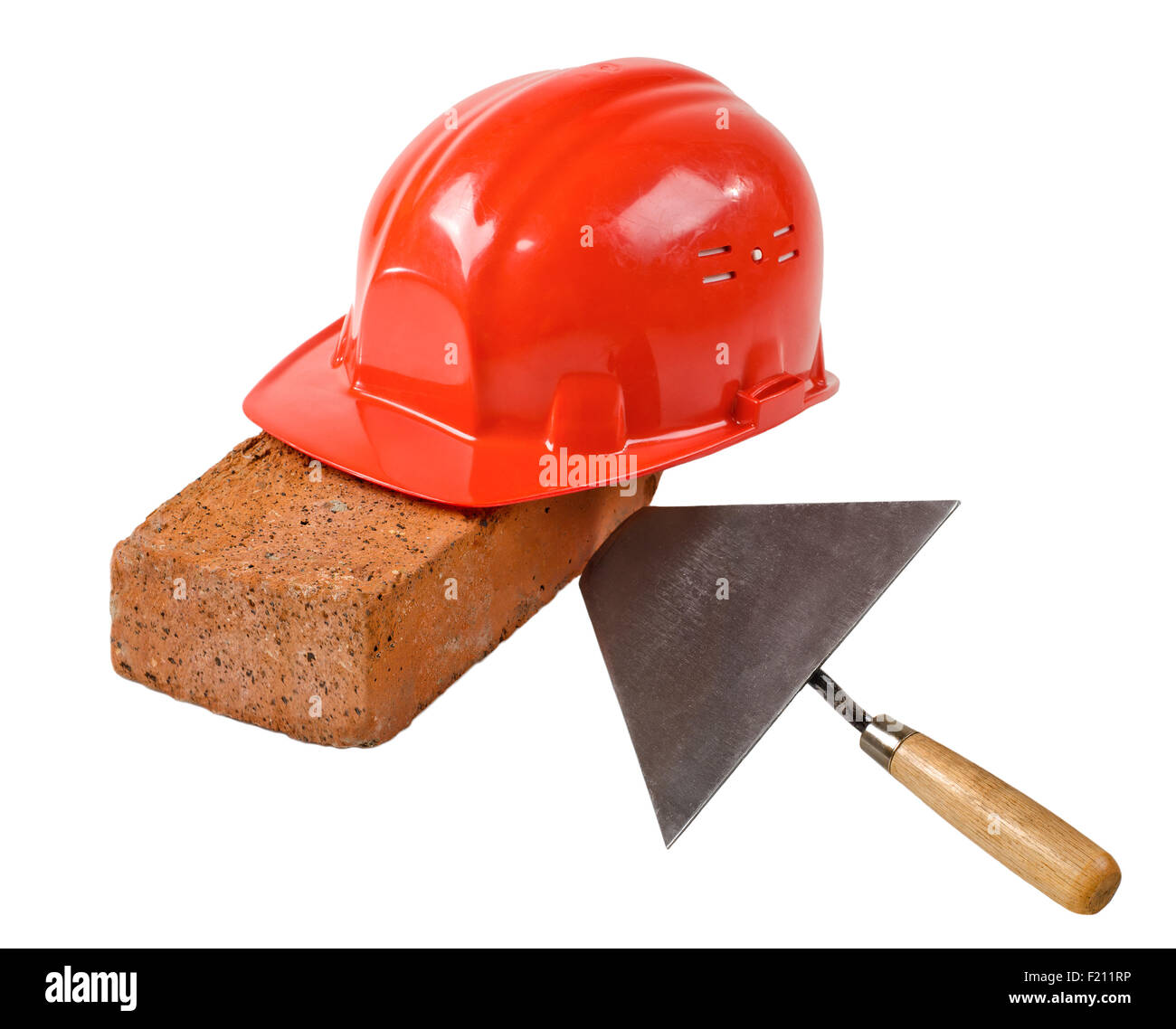 photo beauty red safety cap and brick with plane, close up on white ...