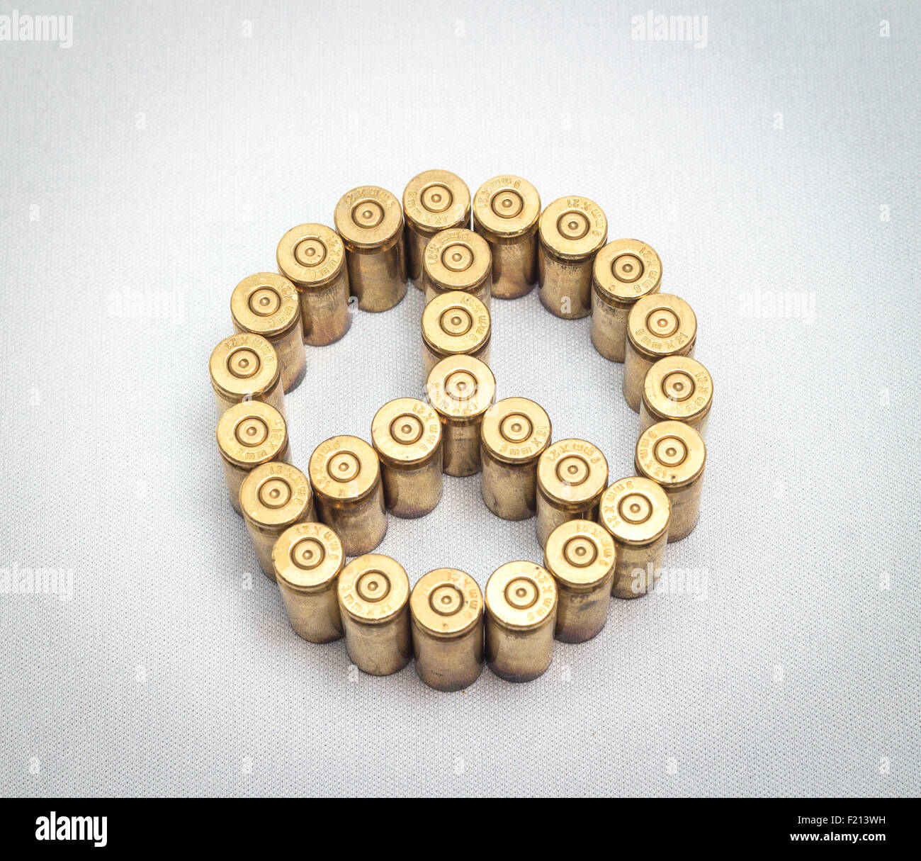 peace symbol formed by bullets over white background, useful for peace ...