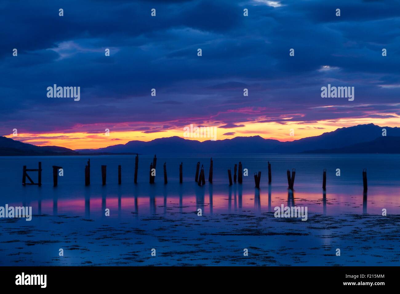 United Kingdom, Scotland, Isle of Mull, Salen, Old pier at sunset ...