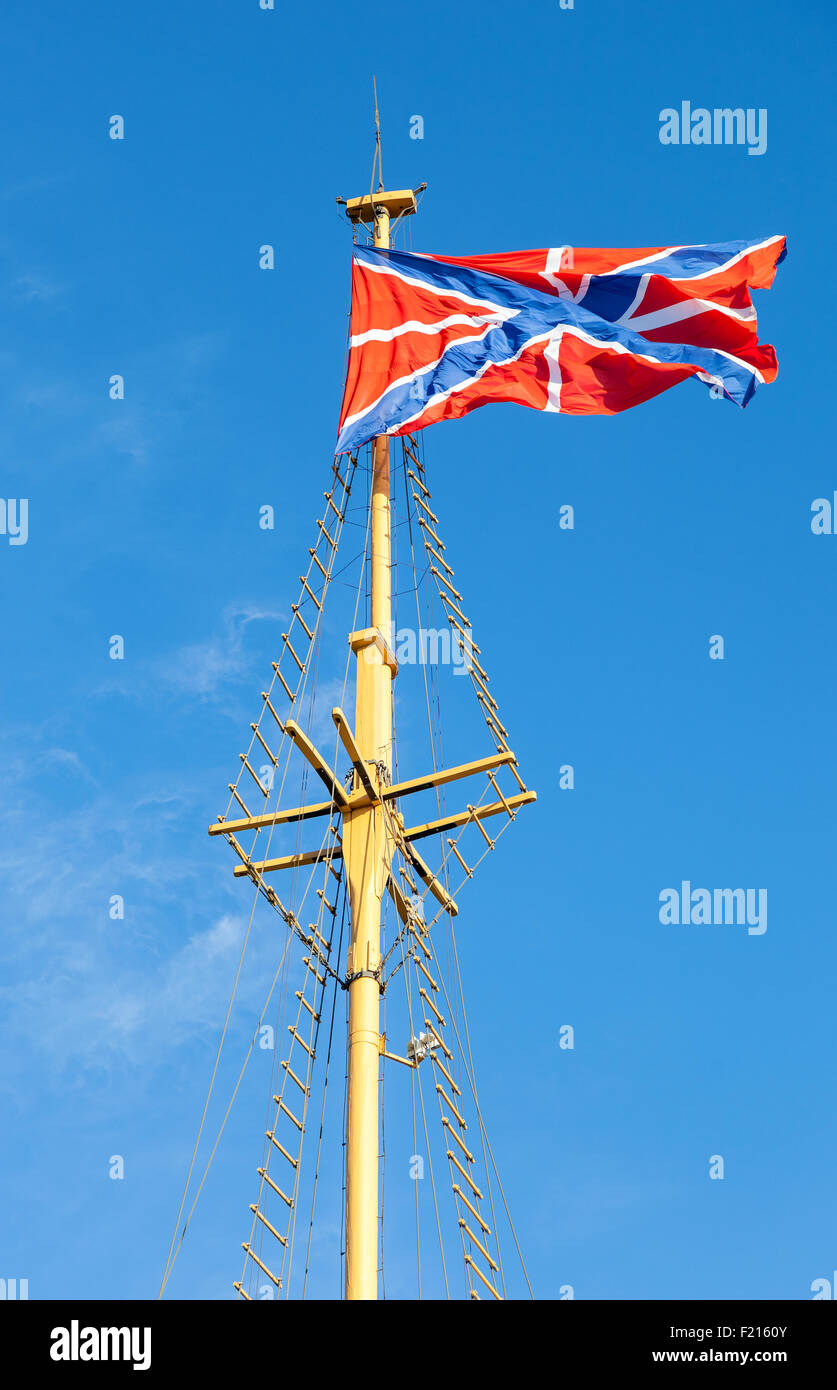 Serf Russian Navy flag on the flagpole against blue sky Stock Photo - Alamy