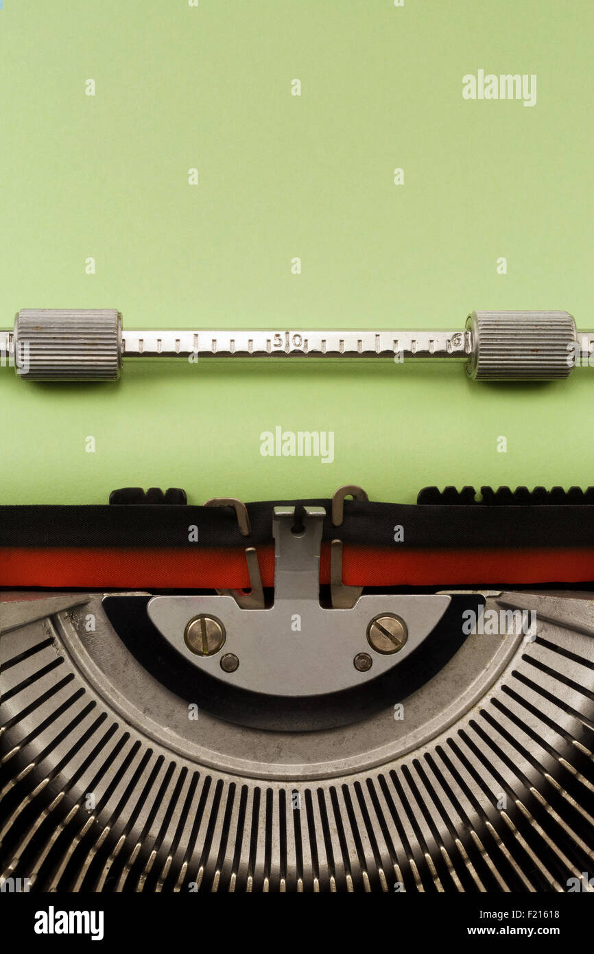 Vintage Typewriter With Empty Green Paper Sheet Vertical Photograph ...