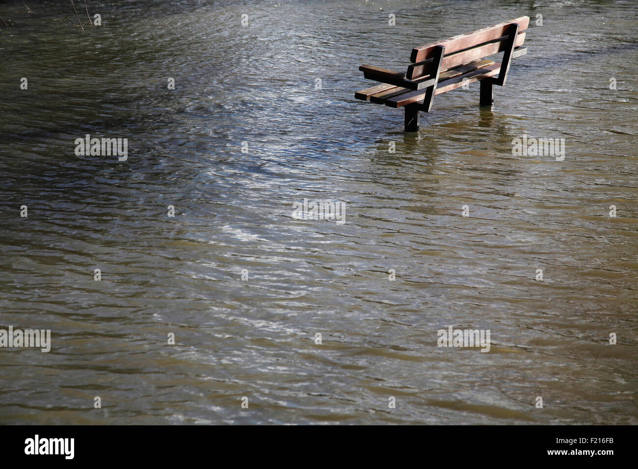 Climate, Weather, Flooding, Bench in flooded public park Stock Photo ...