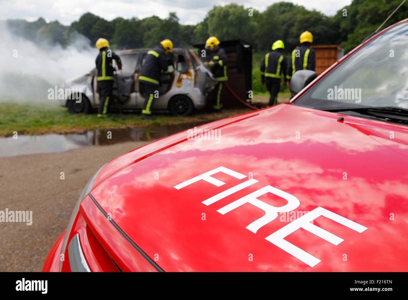 Putting out fire hi-res stock photography and images - Alamy