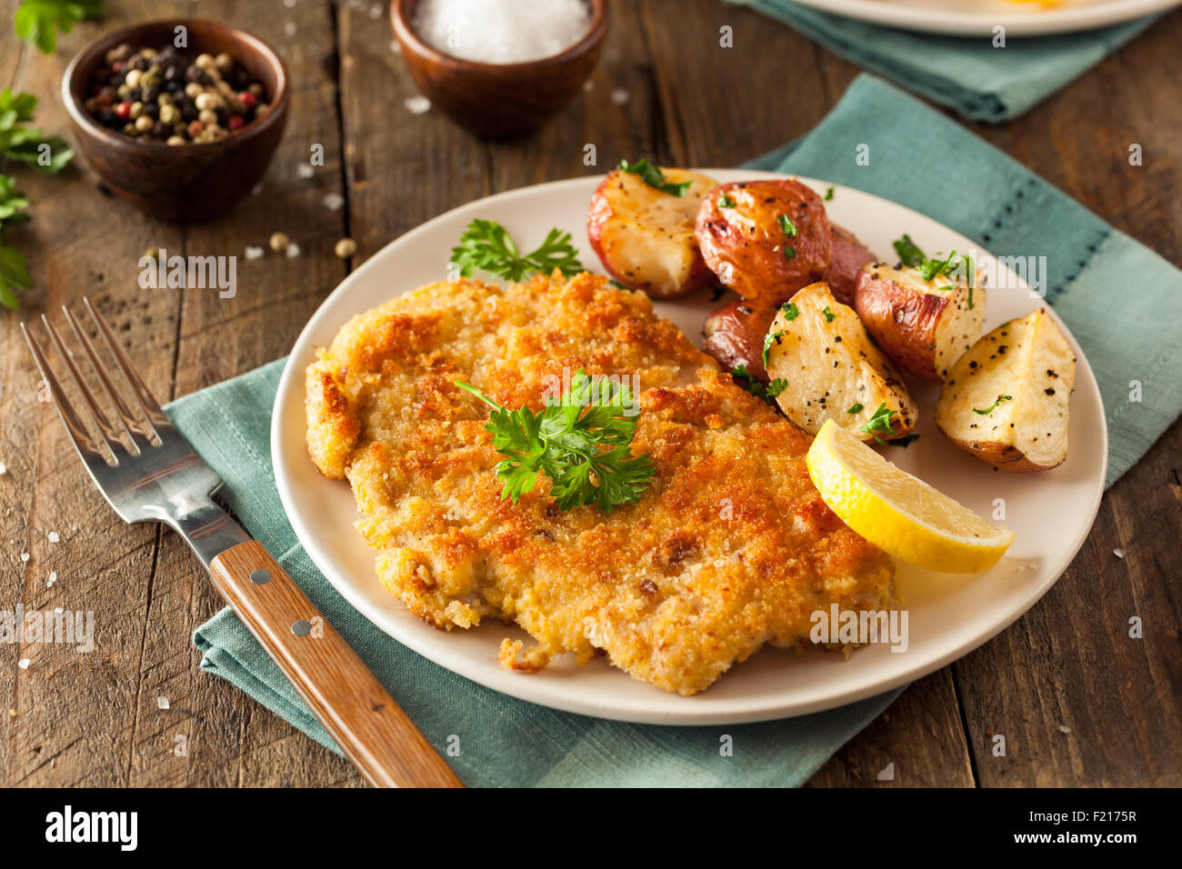 Homemade Breaded German Weiner Schnitzel with Potatoes Stock Photo - Alamy