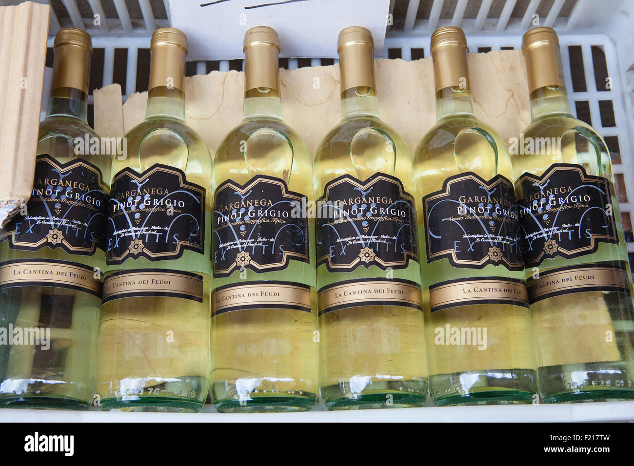 Italy, Tuscany, Lucca, Barga, Bottles of Pinot Grigio white wine for ...