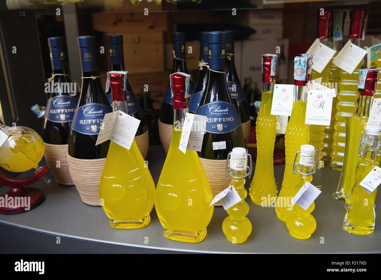 Italy, Tuscany, Lucca, Barga, Display of Limoncino & Ruffino Chiante in ...
