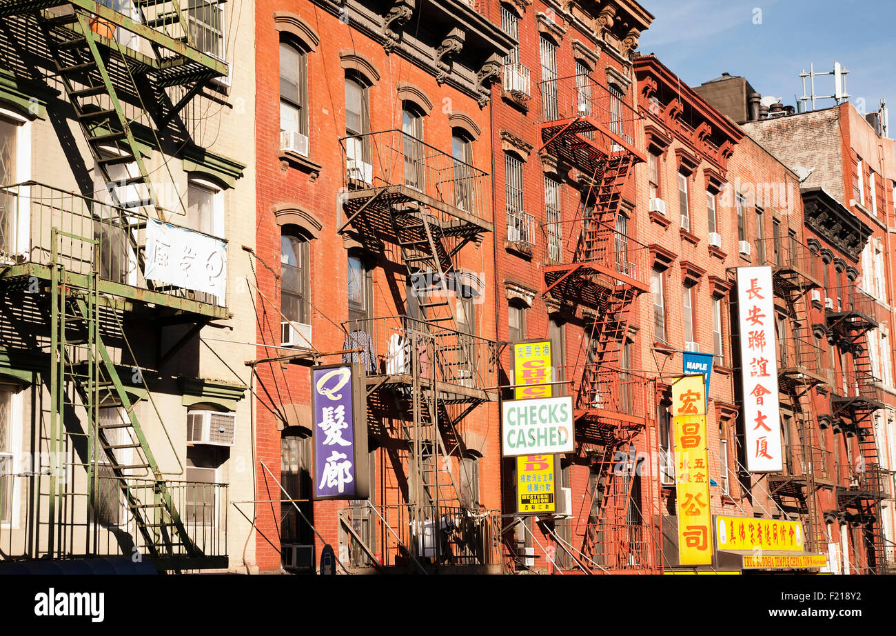 USA, New York, Manhattan, Chinatown, Typical buildings with fire ...