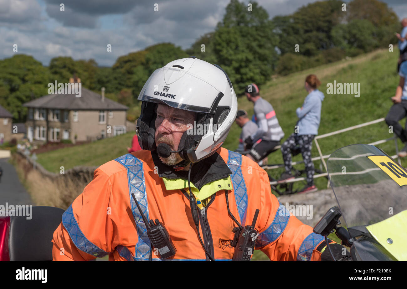 Race Marshall in the 2015 Tout of Britain Stock Photo - Alamy