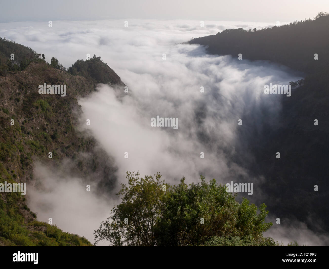 Clowds falling down the mountains in Madeira island interior Stock ...