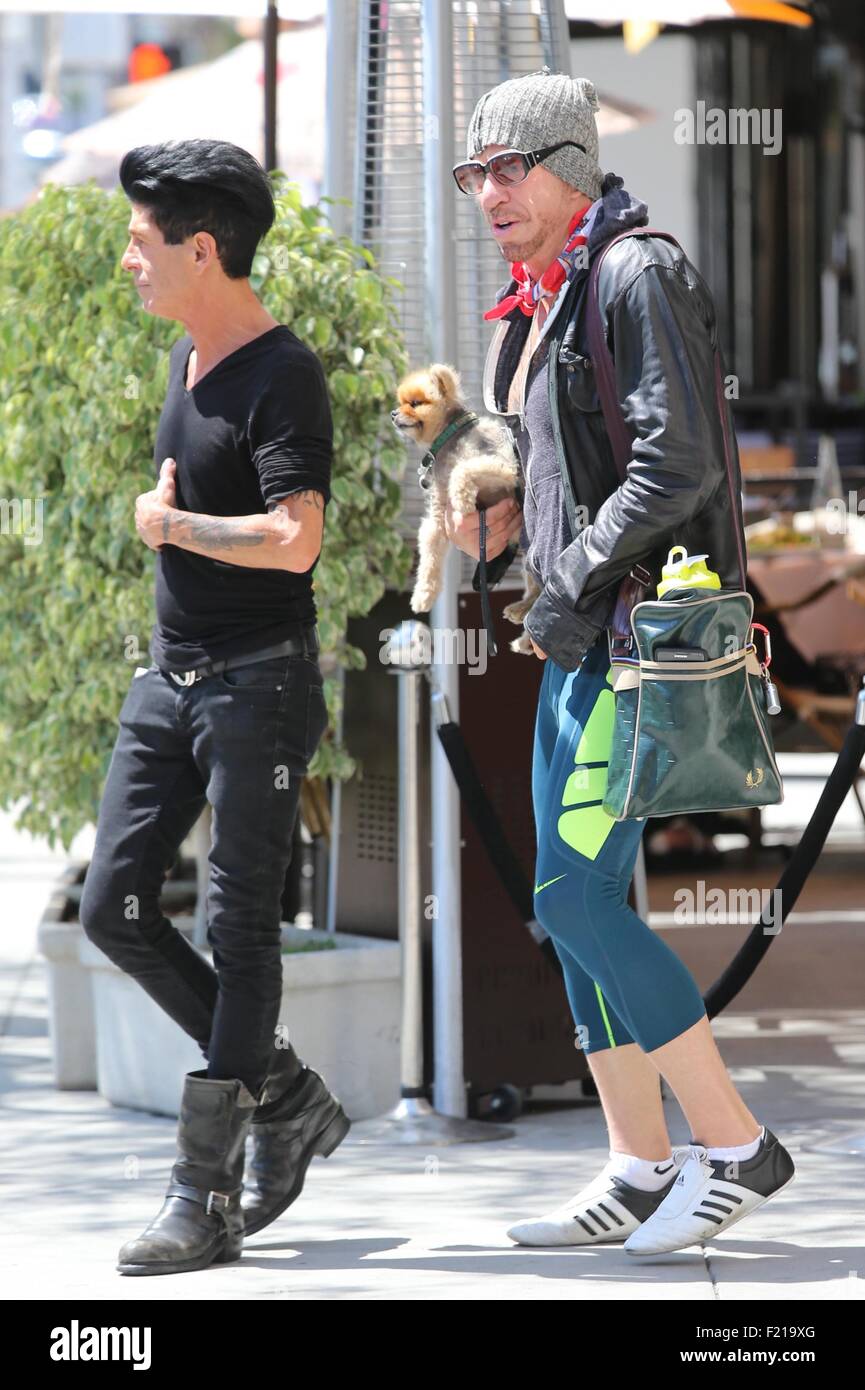 Mickey Rourke steps out for lunch at Cafe Roma with one of his dogs and ...