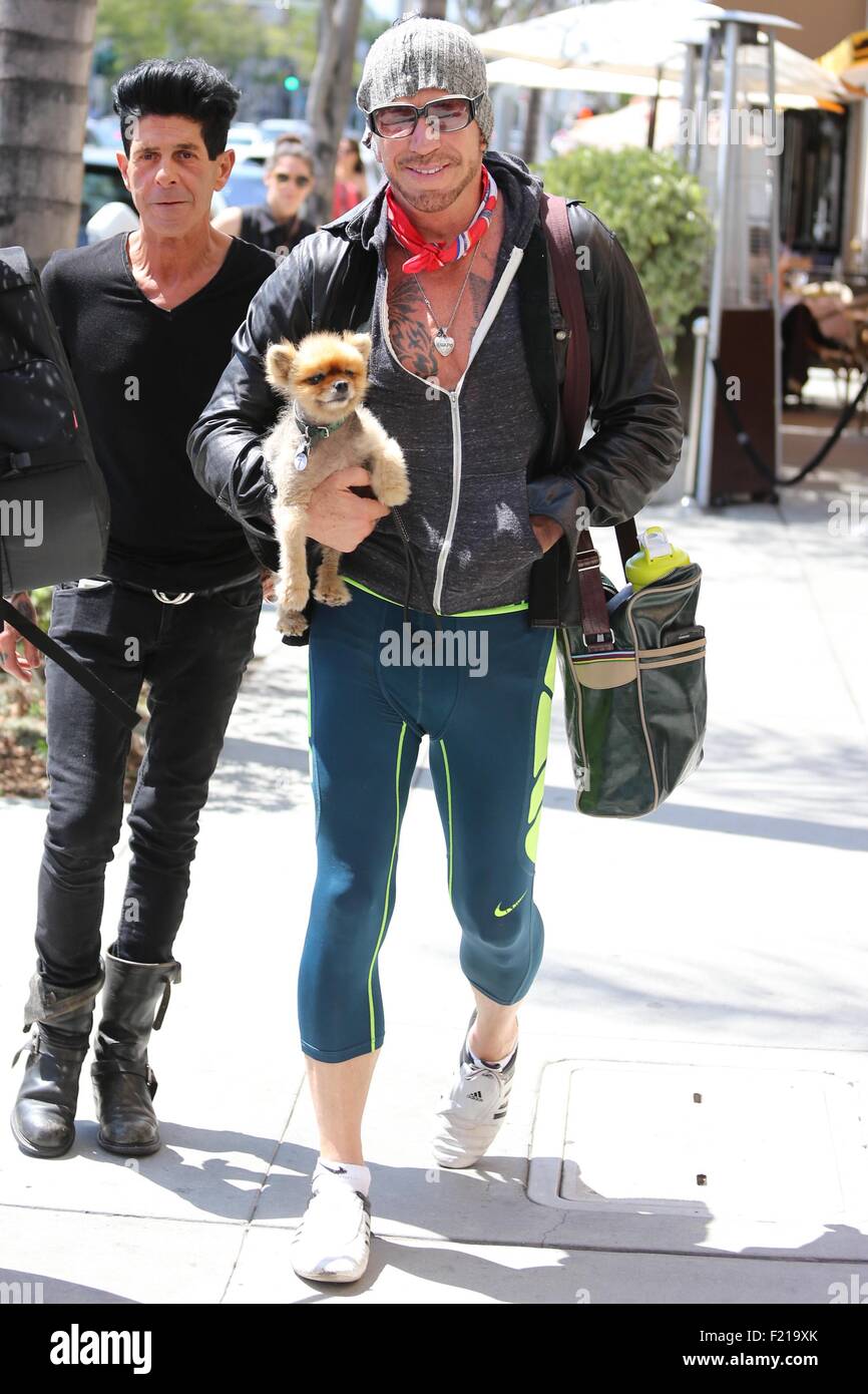 Mickey Rourke steps out for lunch at Cafe Roma with one of his dogs and ...