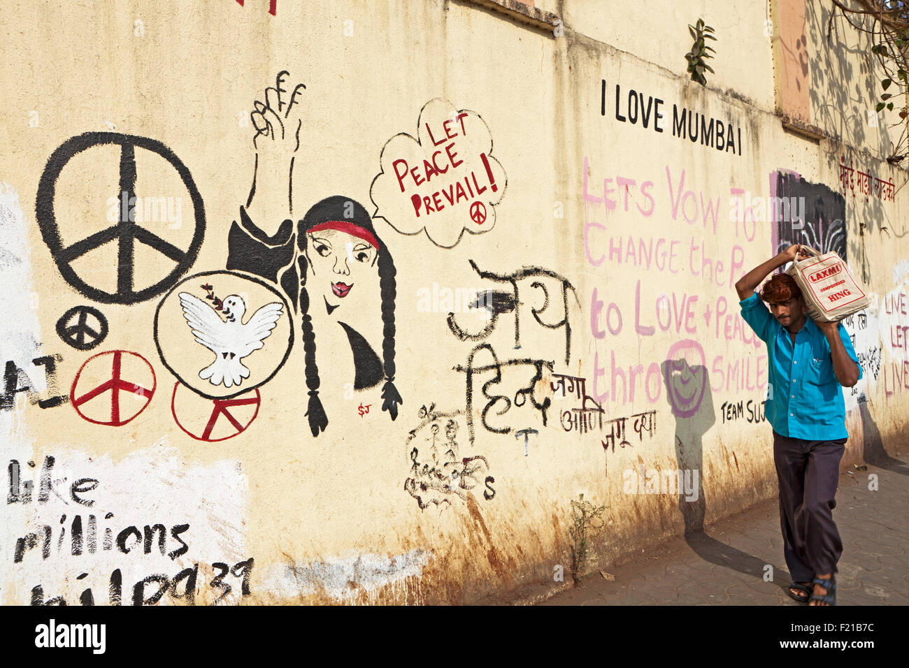 India Maharashtra Mumbai 'Art wall' covered with slogans graffiti and ...