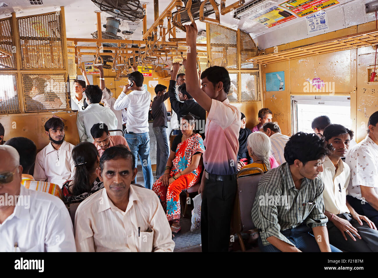 India, Maharashtra, Mumbai, Interior of second class carriage of a ...