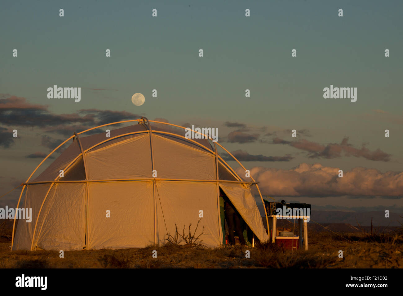 Mexico. San Ignacio Lagoon. Moon rising over tents Stock Photo - Alamy
