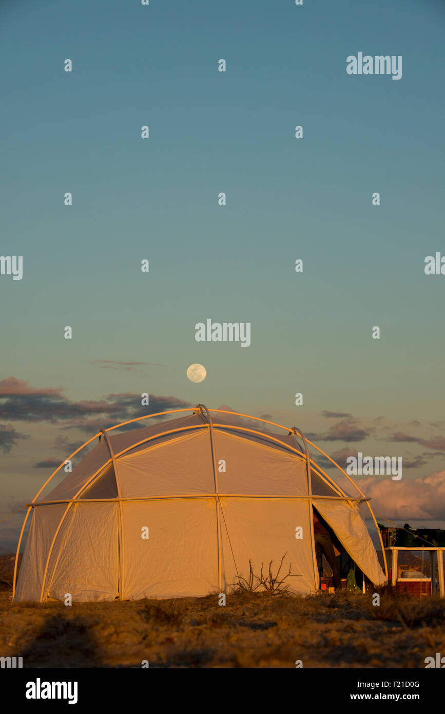 Mexico. San Ignacio Lagoon. Moon rising over tents Stock Photo - Alamy