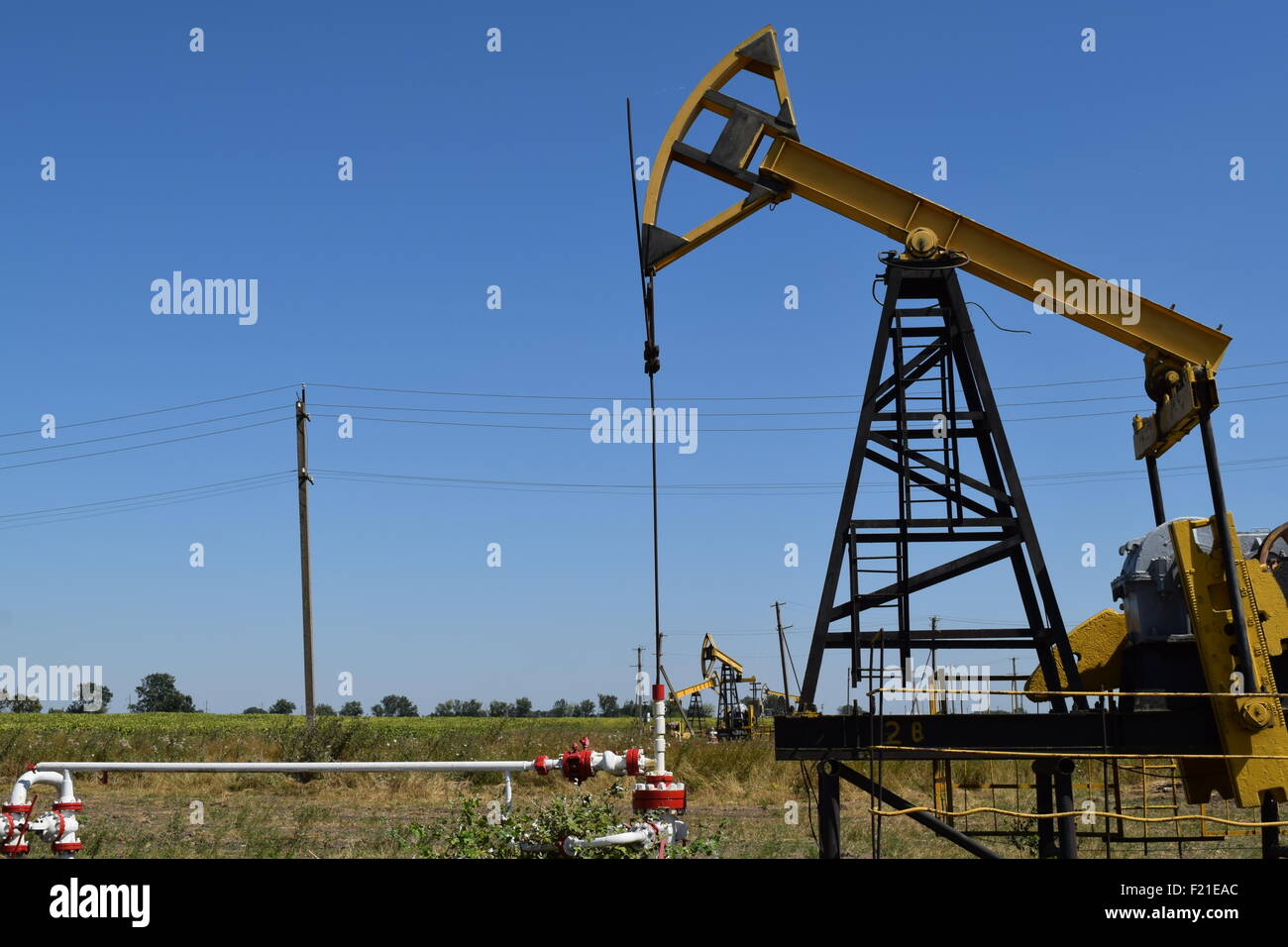 The pumping unit as the oil pump installed on a well. Equipment of oil ...