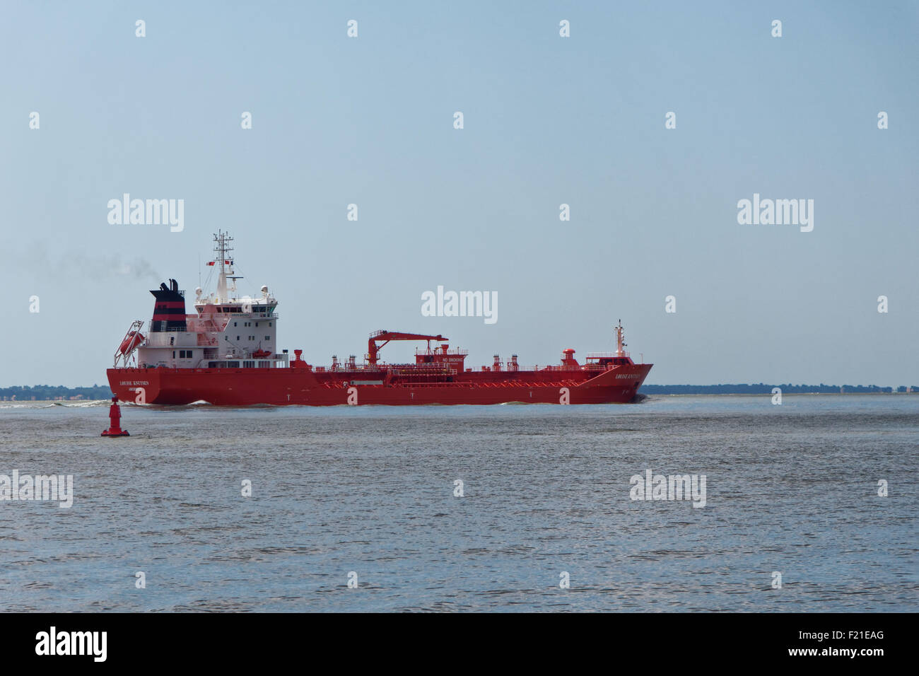 tanker and lighthouse Stock Photo - Alamy