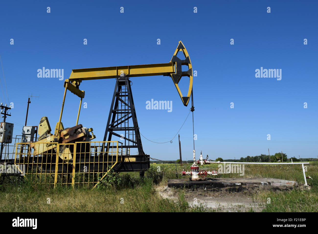 The pumping unit as the oil pump installed on a well. Equipment of oil ...
