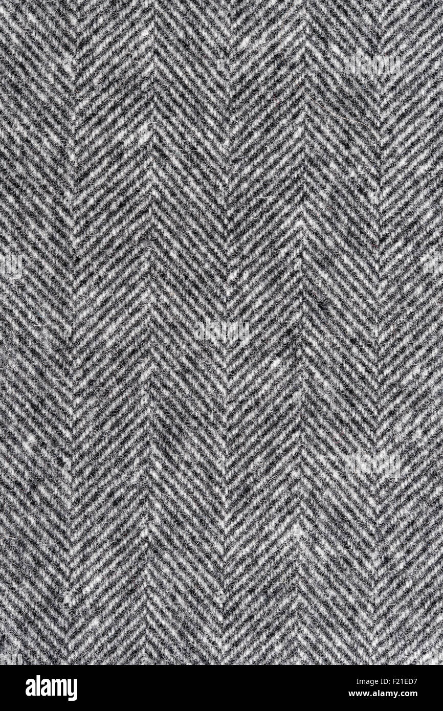Herringbone tweed background with closeup on wool fabric texture Stock ...