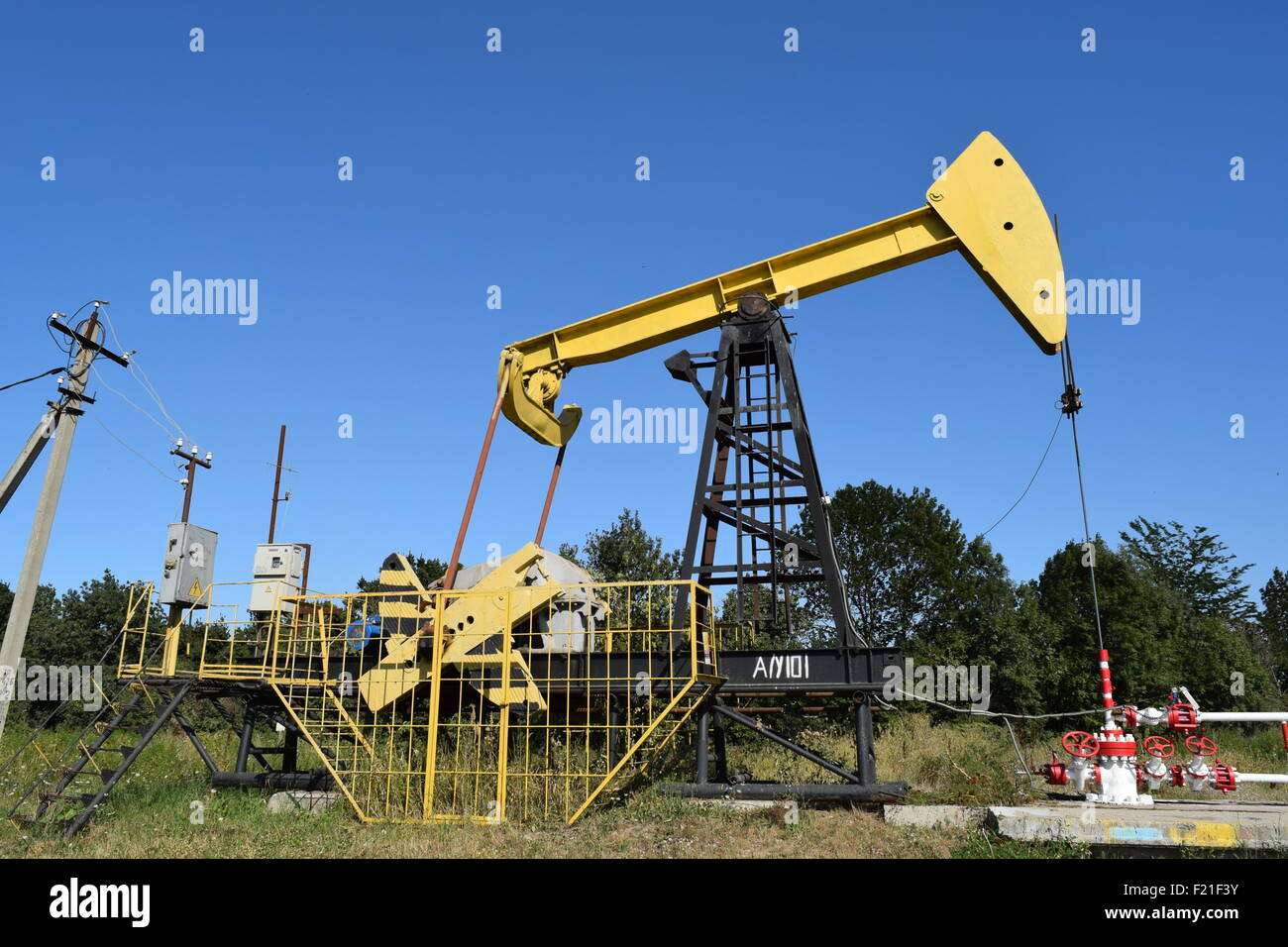 The pumping unit as the oil pump installed on a well. Equipment of oil ...