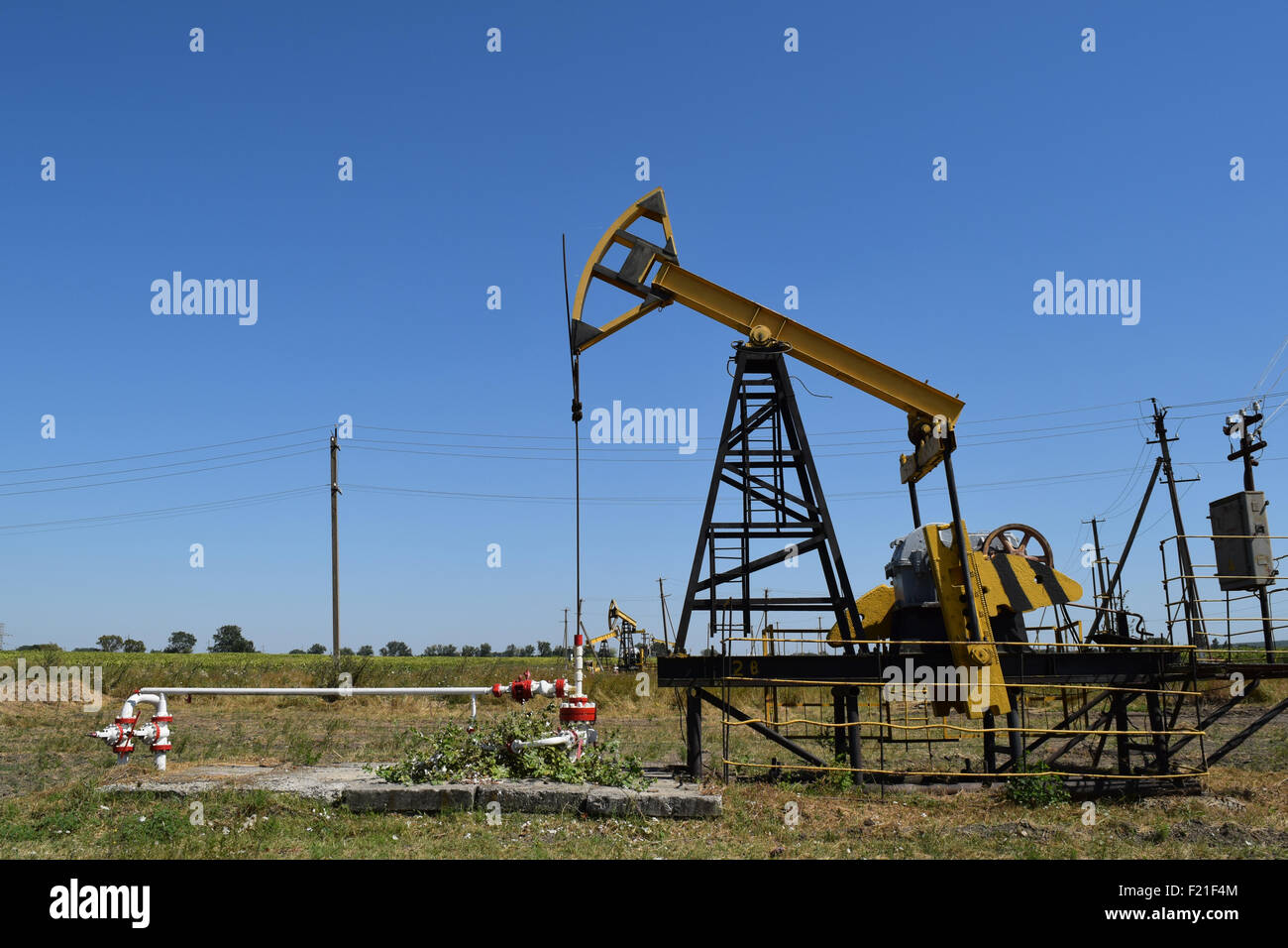 The pumping unit as the oil pump installed on a well. Equipment of oil ...