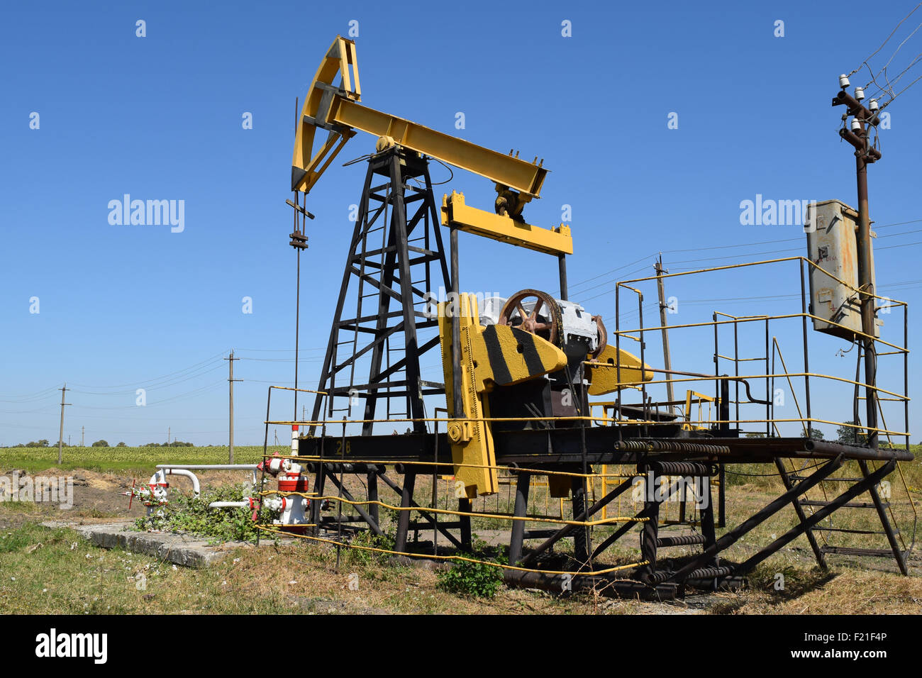 The pumping unit as the oil pump installed on a well. Equipment of oil ...